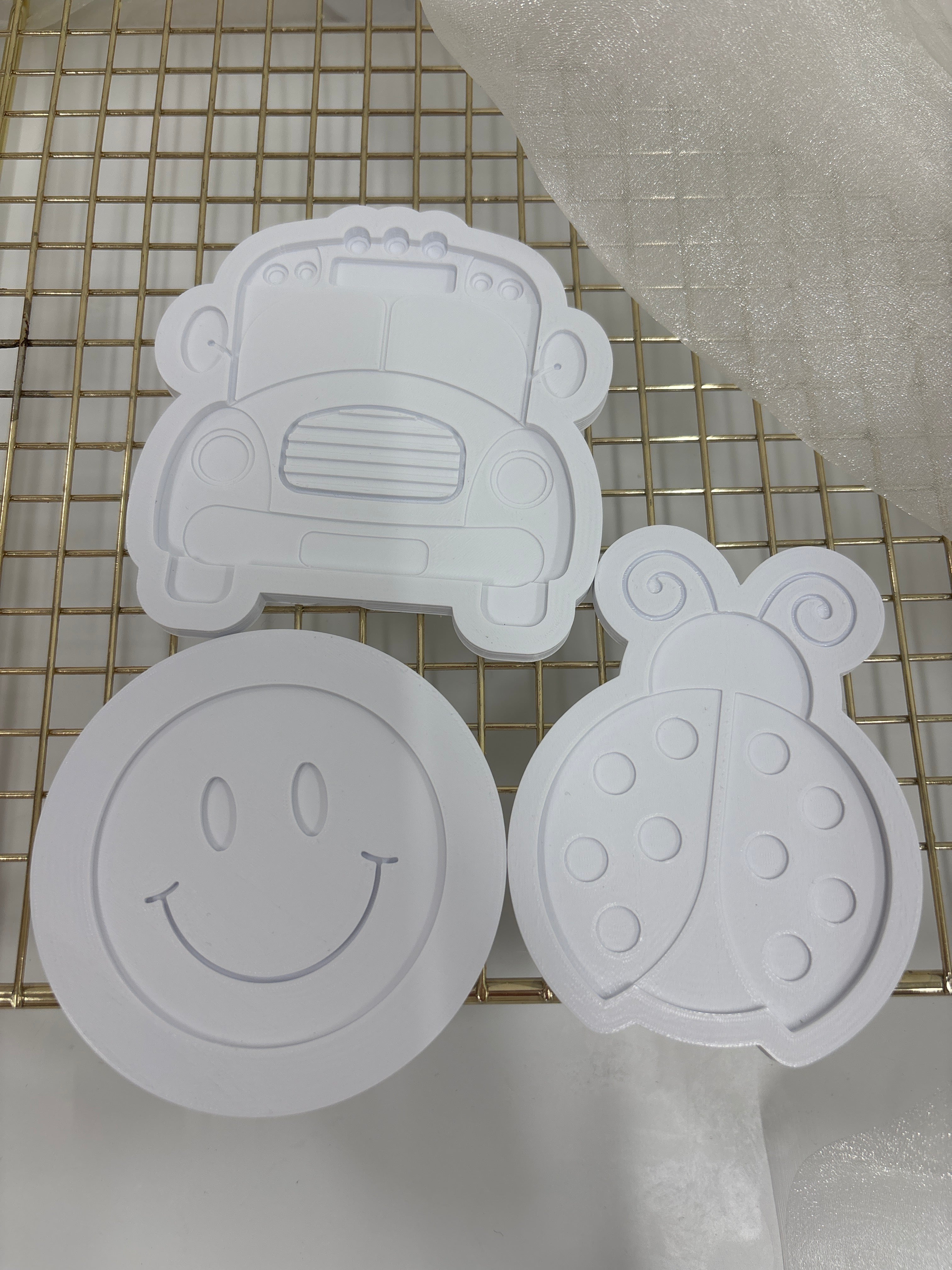 Odd Bunch- smiley face, ladybug & school bus– Boss Embossers